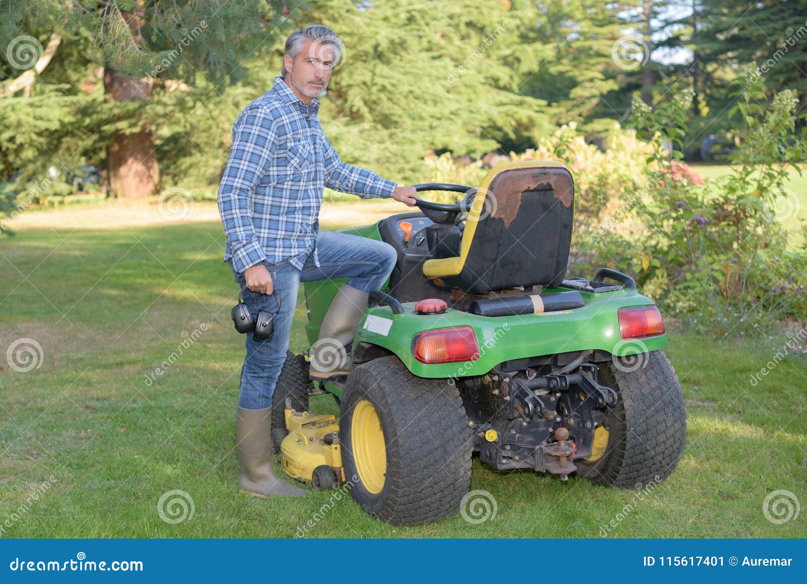 Man Getting on Ride on Mower Stock Image - Image of motor, grass: 115617401