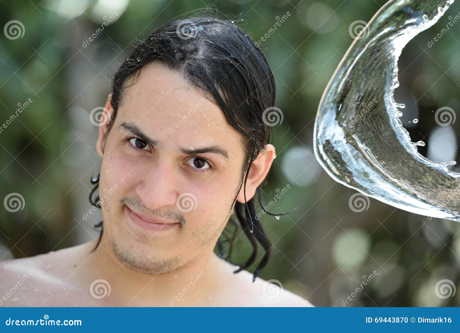 Man Getting Splash in Action Stock Photo - Image of young, hair: 69443870