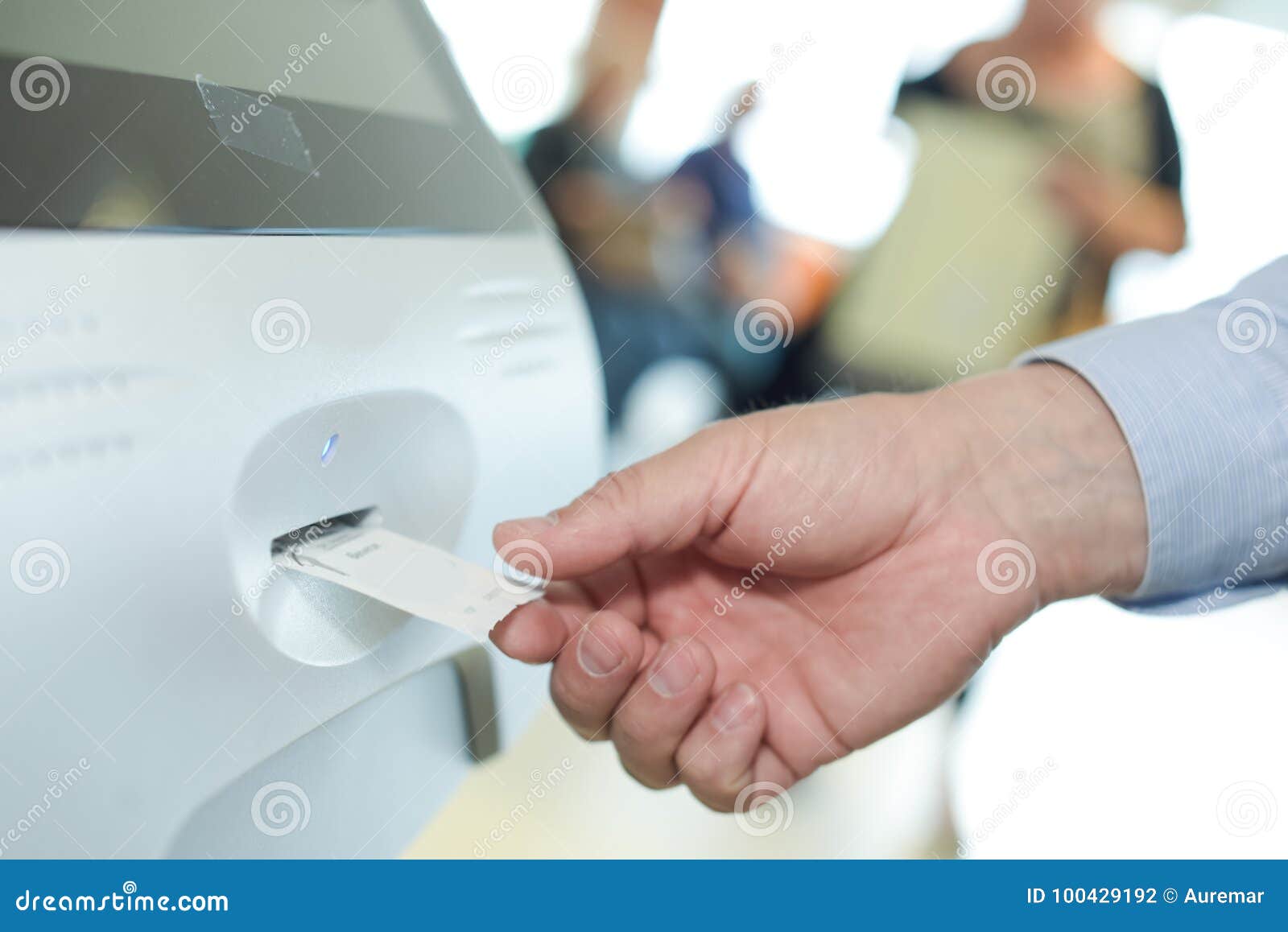 Man Getting Ticket from Machine Stock Photo - Image of selling, office ...