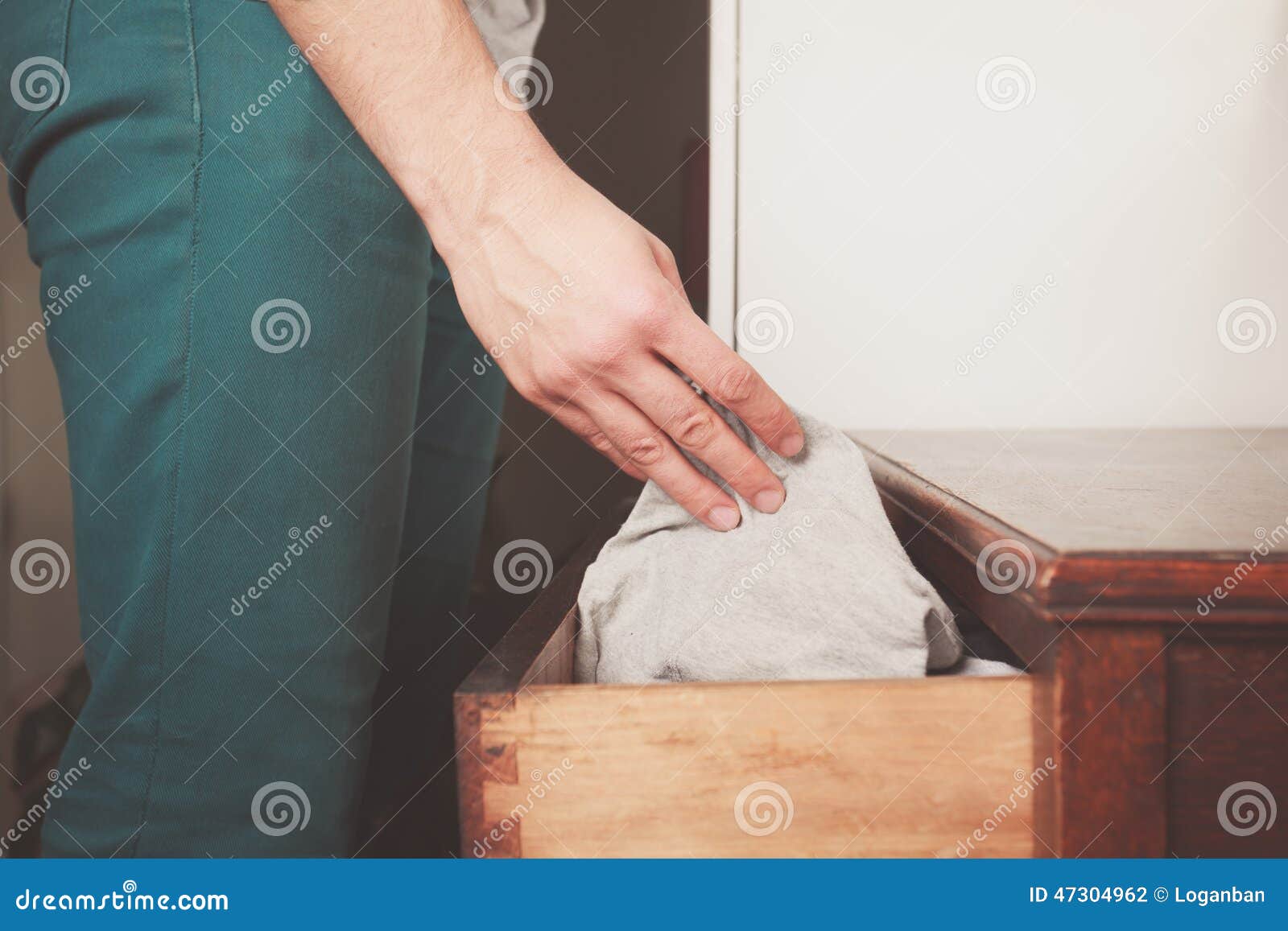 Man Getting Underwear from Drawer Stock Photo - Image of picking ...