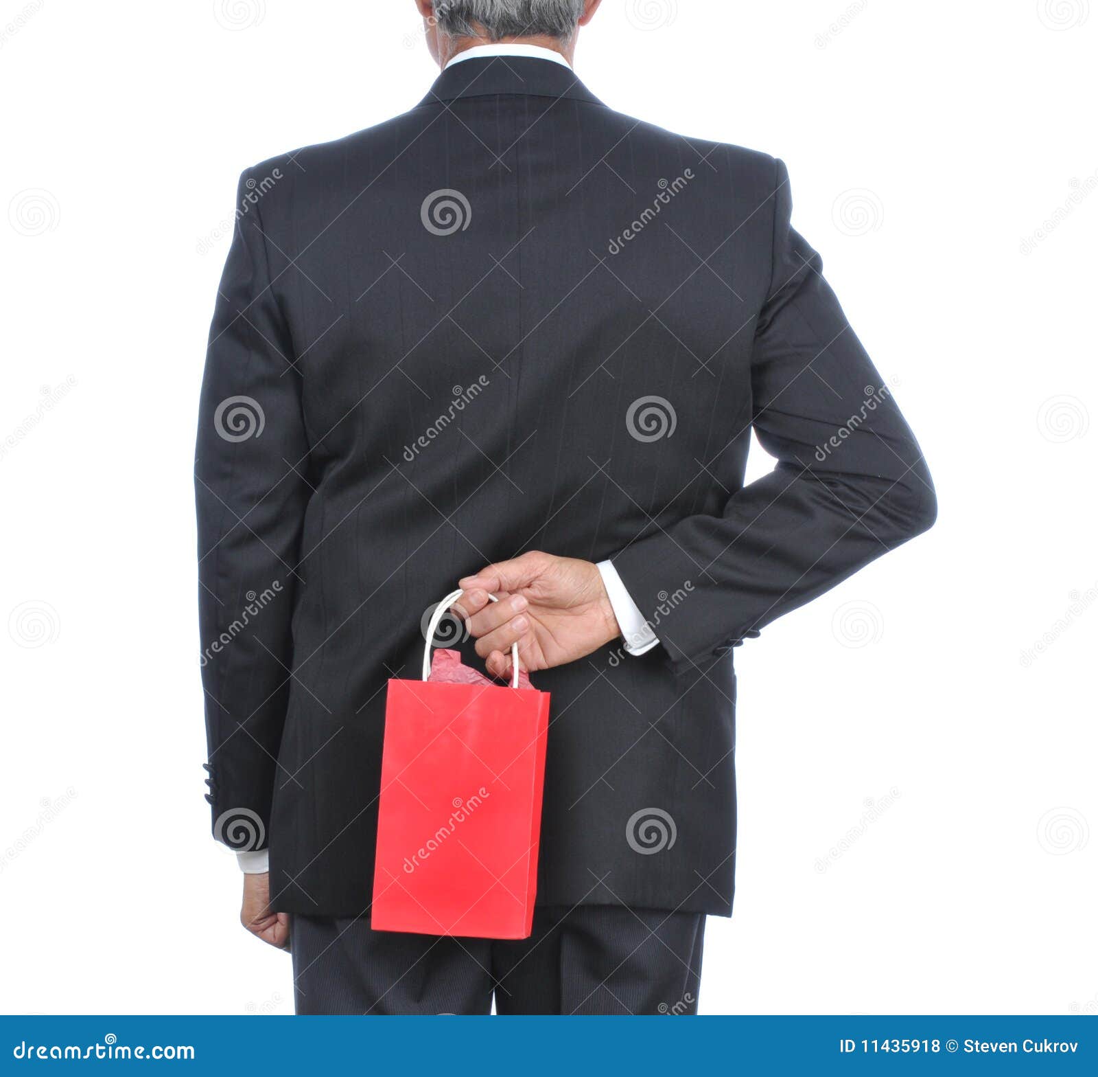 Man with Gift Bag Behind Back Stock Photo - Image of male, giftbag ...