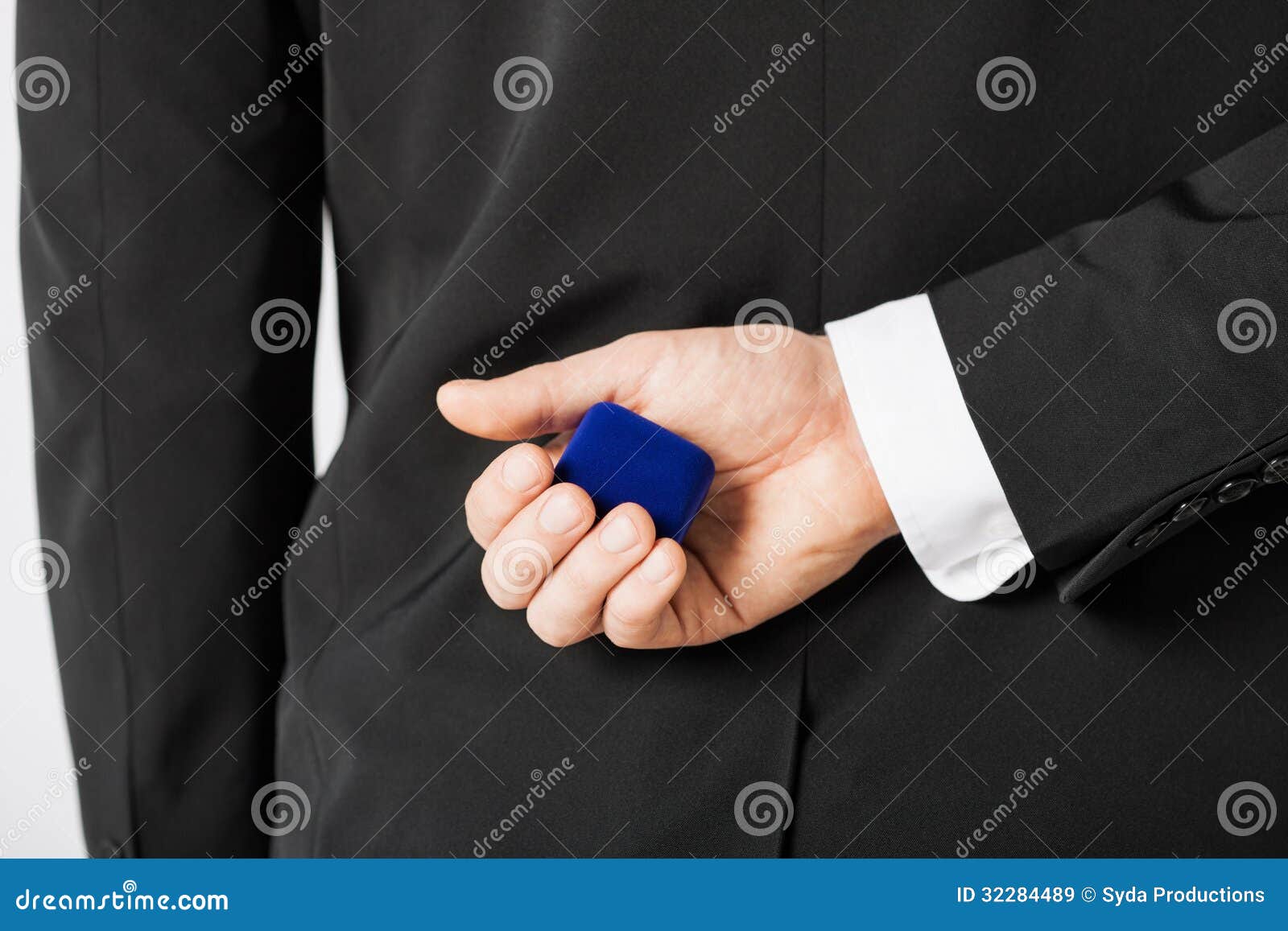 Man with gift box in suit stock image. Image of holding - 32284489