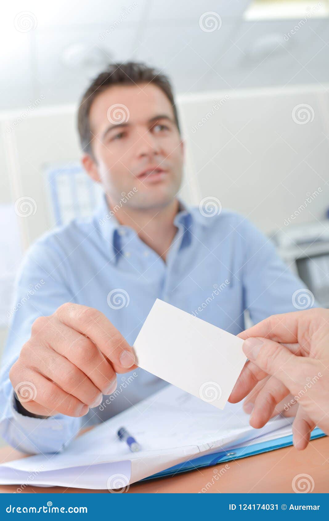 Man giving card in office stock image. Image of office - 124174031
