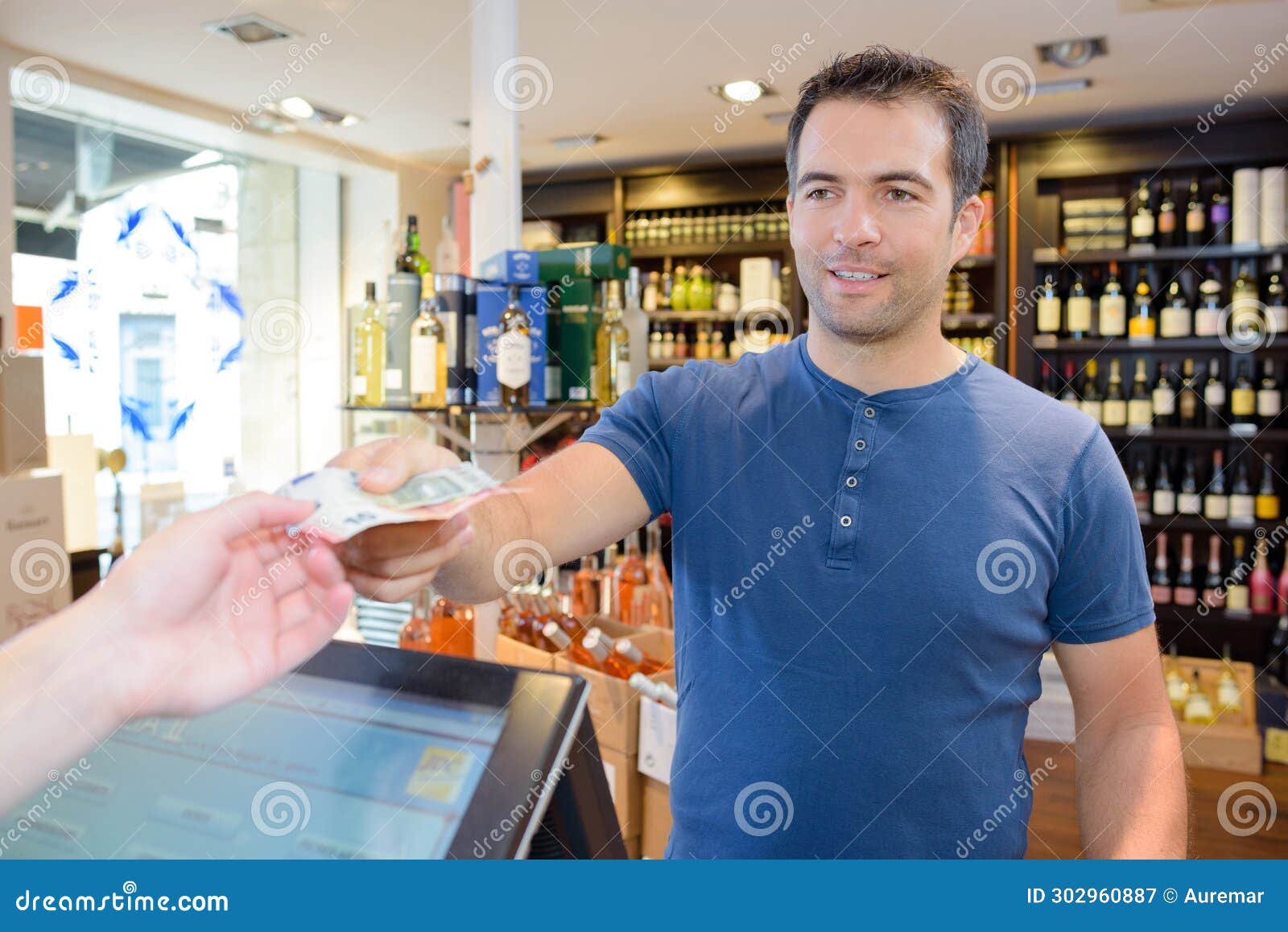 Man giving change stock image. Image of bottle, profit - 302960887