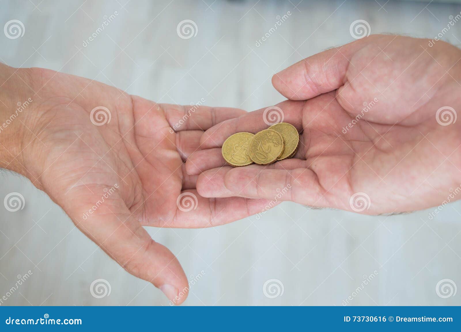 Man Giving Coins To Another Person Stock Photo - Image of closeup ...