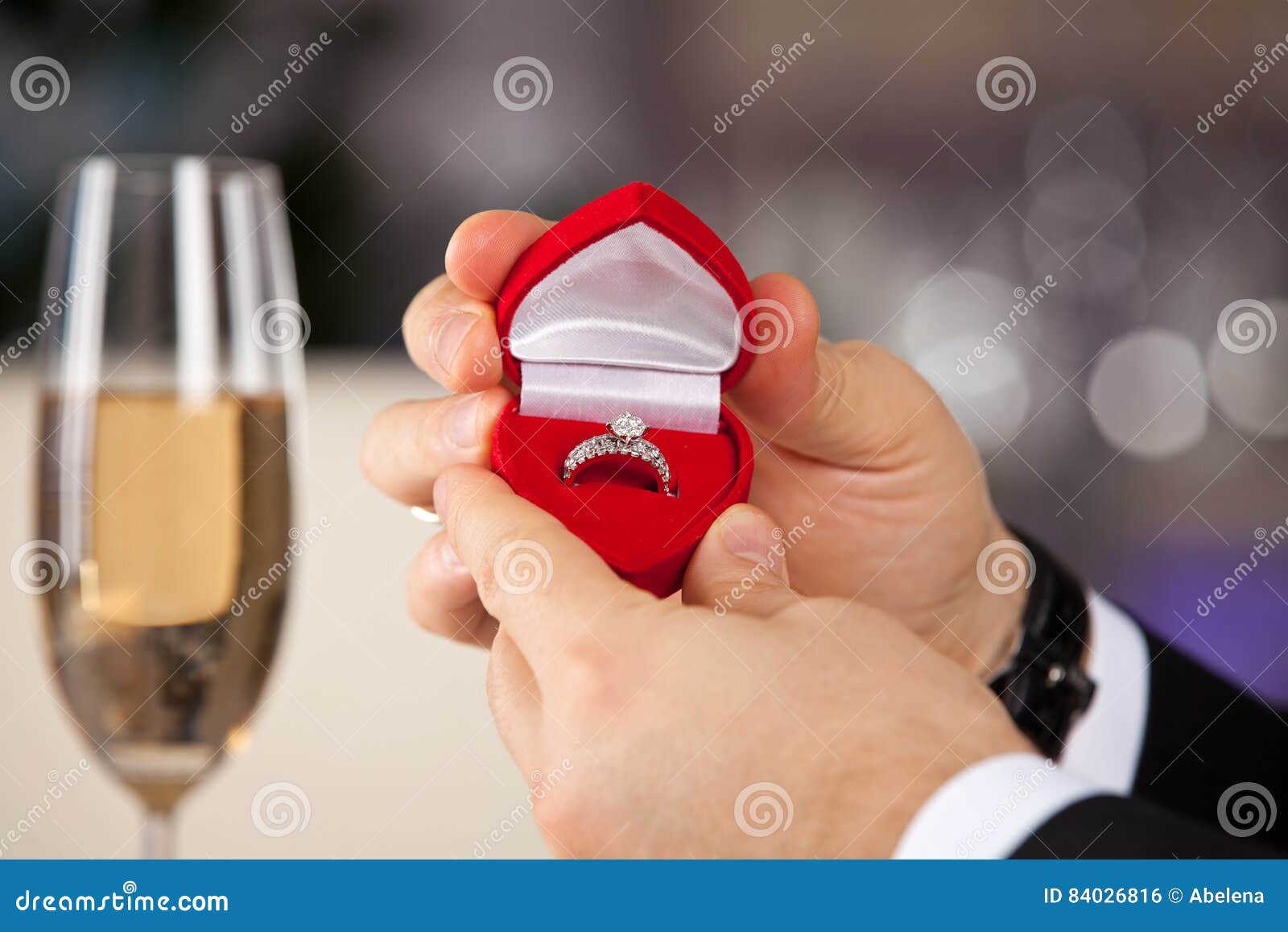 Man Giving Engagement Box with Ring. Stock Photo - Image of golden ...