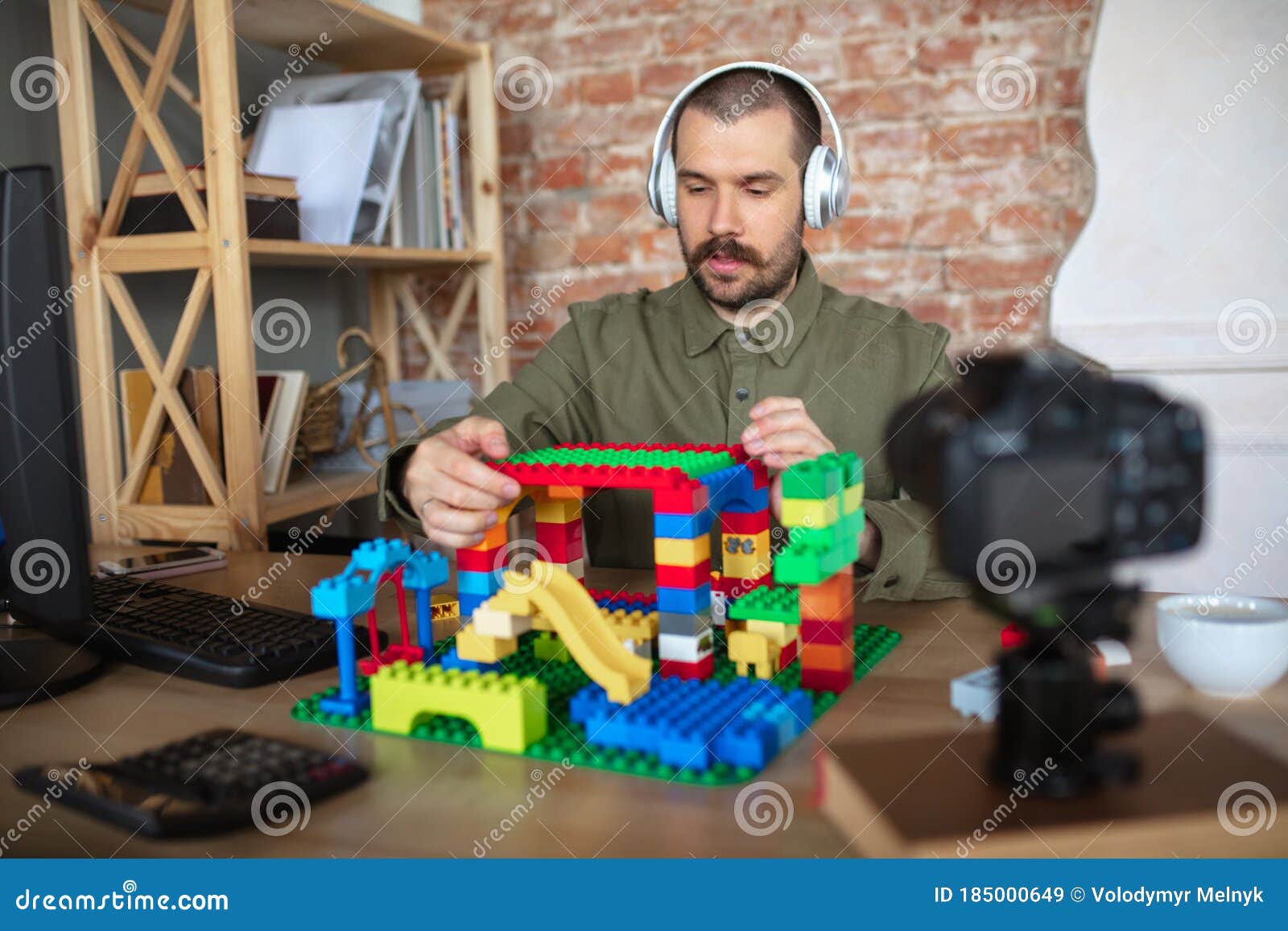 Man Giving Online Lesson with Constructor at Home. Recording Teacher`s ...