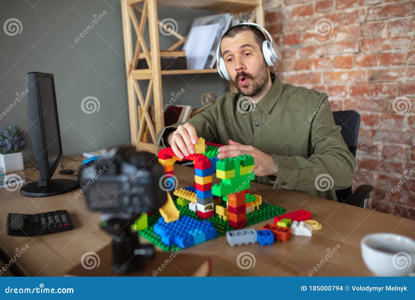 Man Giving Online Lesson with Constructor at Home. Recording Teacher`s ...