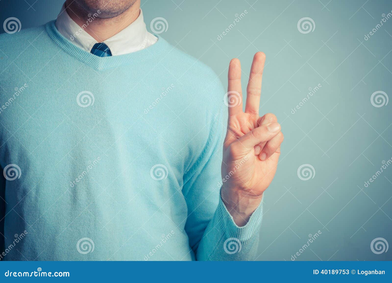 Man giving peace sign stock image. Image of victory, male - 40189753
