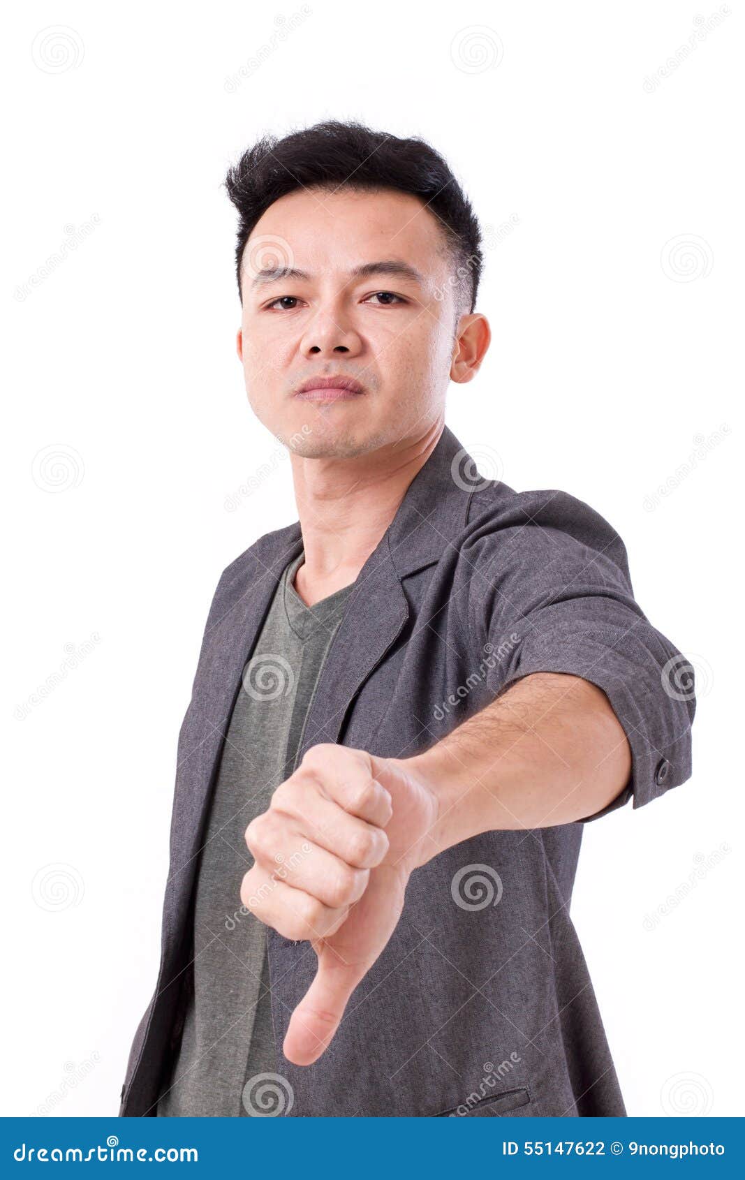 Man Giving Thumb Down, Looking at You Stock Photo - Image of ...
