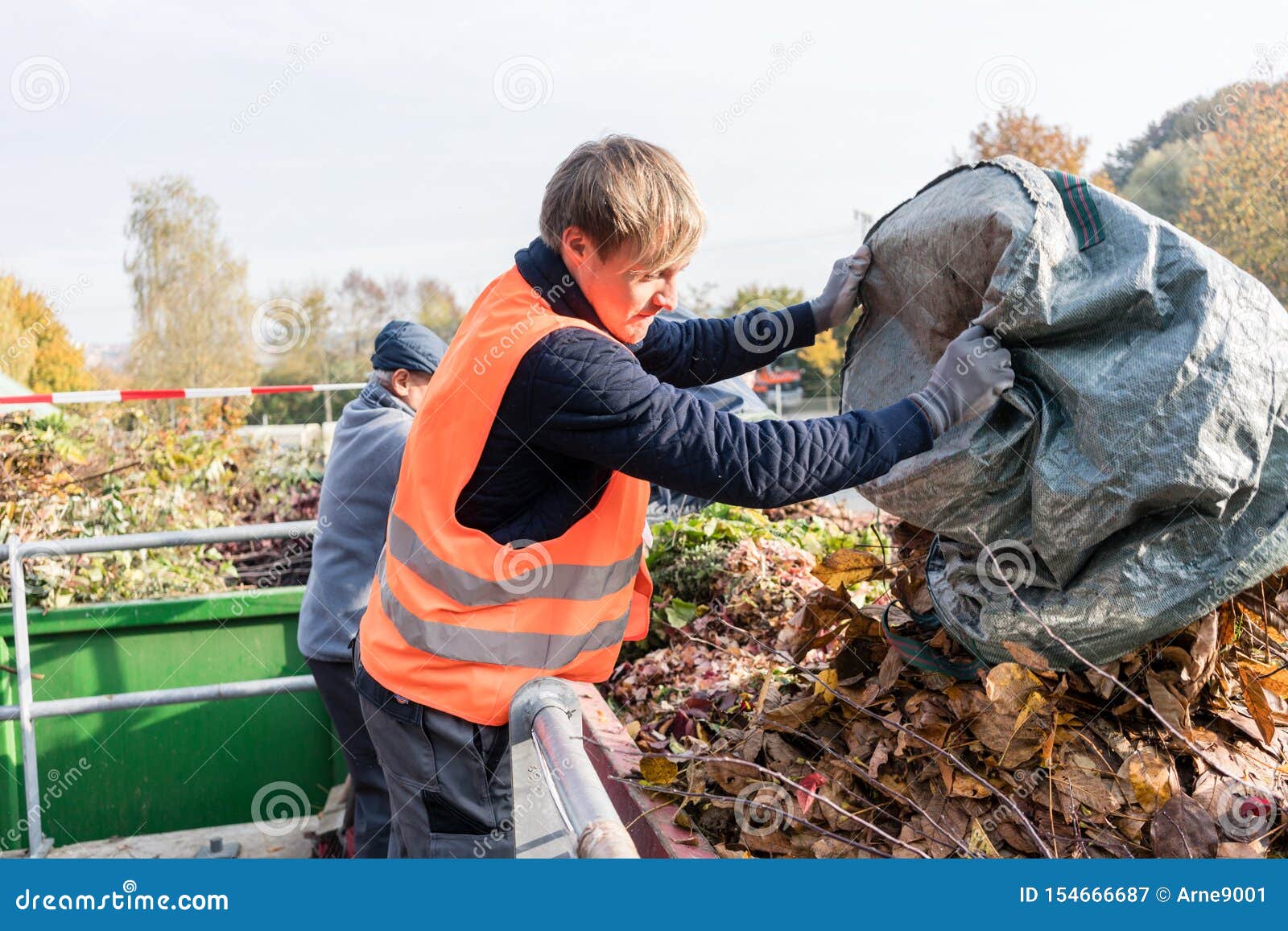 Man Giving Waste Green in Container on Recycling Center Stock Image ...