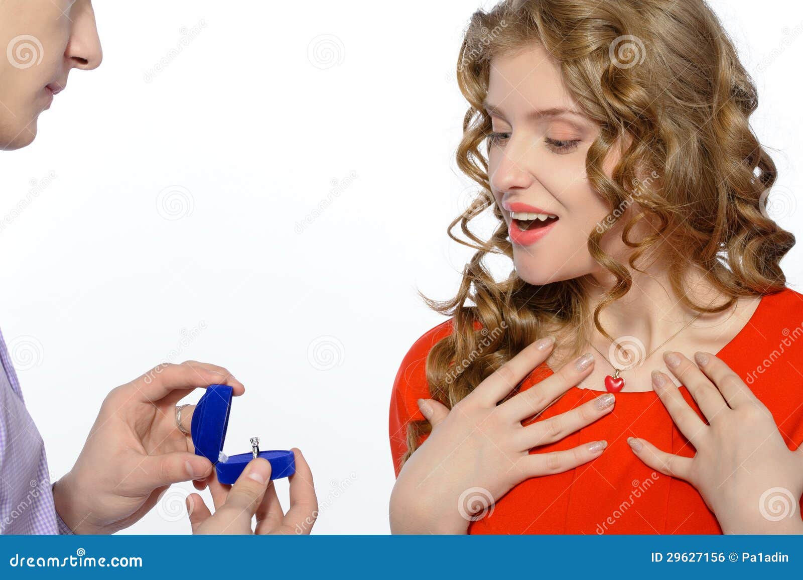 Man Giving a Woman an Engagement Ring Stock Photo - Image of ...