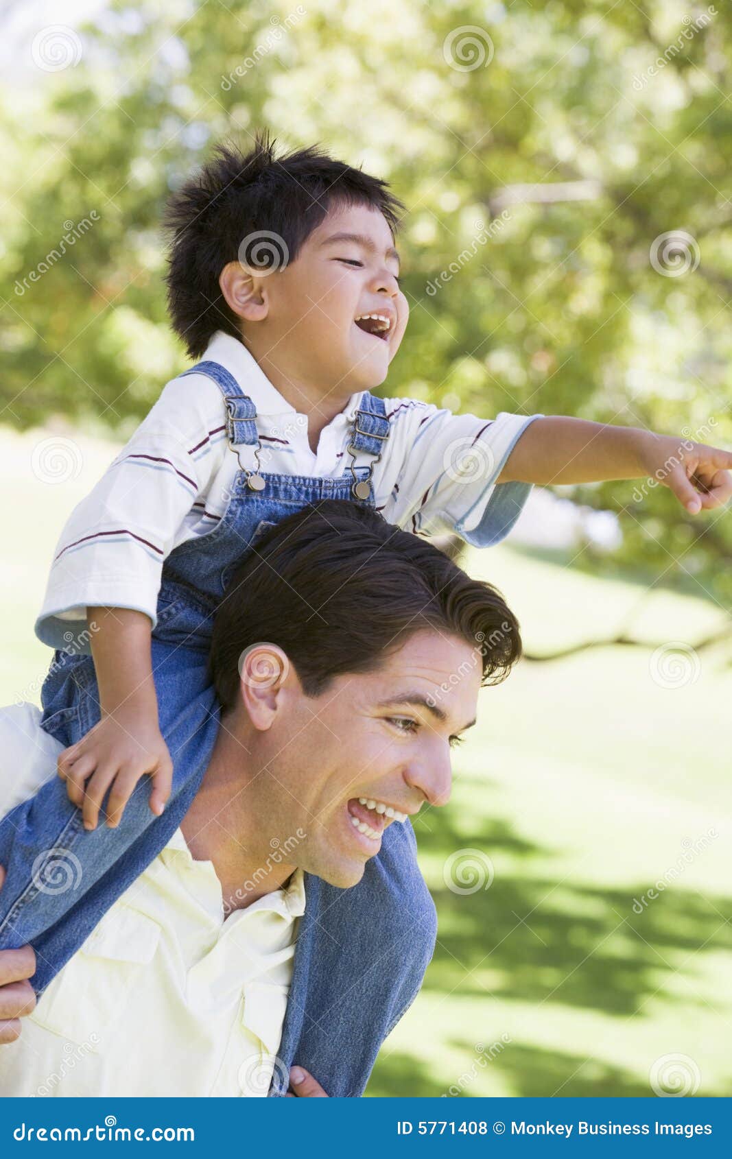 Man Giving Young Boy Shoulder Ride Smiling Stock Photo - Image of ...