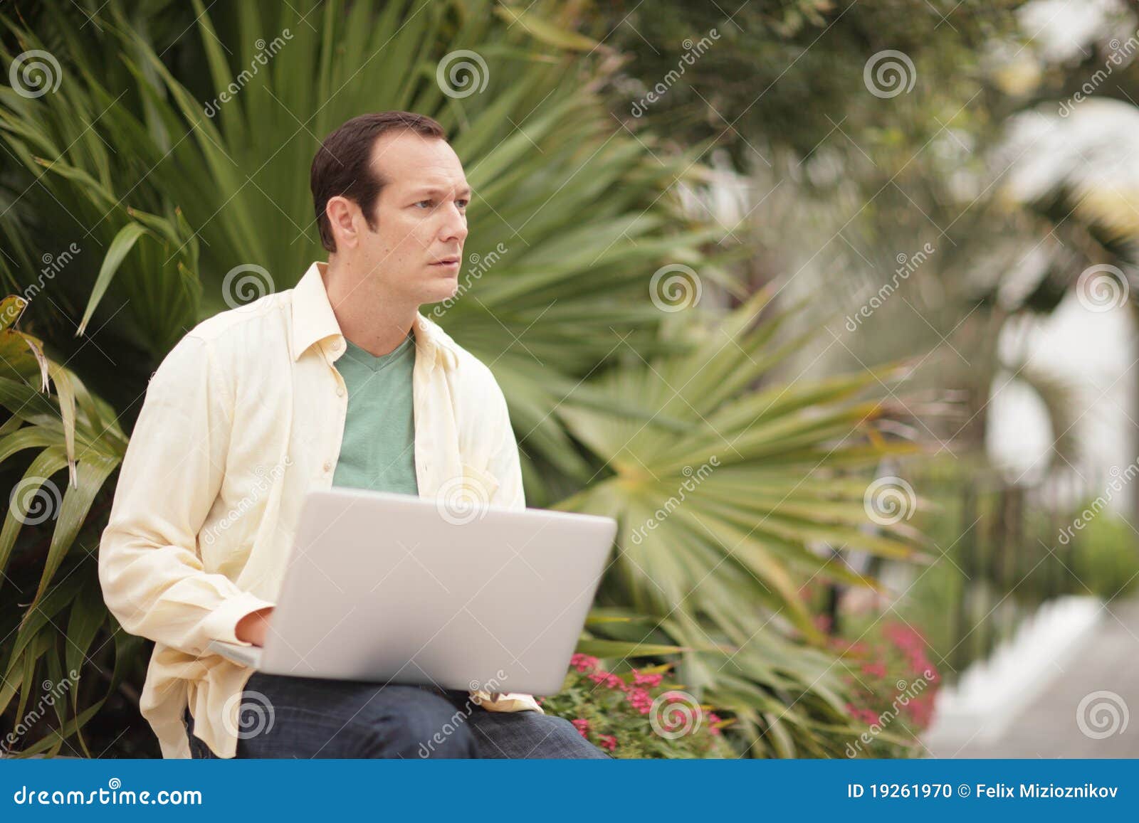 Man Glancing from His Computer Stock Photo - Image of person, handsome ...
