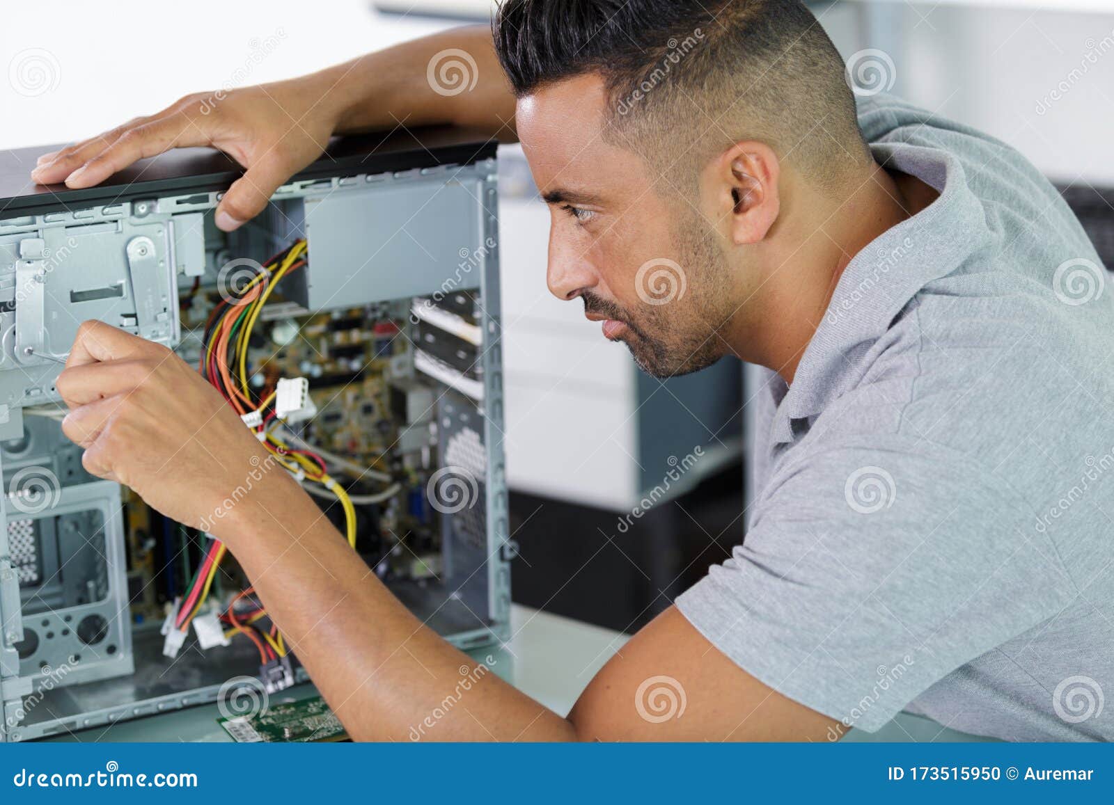 Man in Glasses Looking at Camera while he Fixing Pc Stock Photo - Image ...