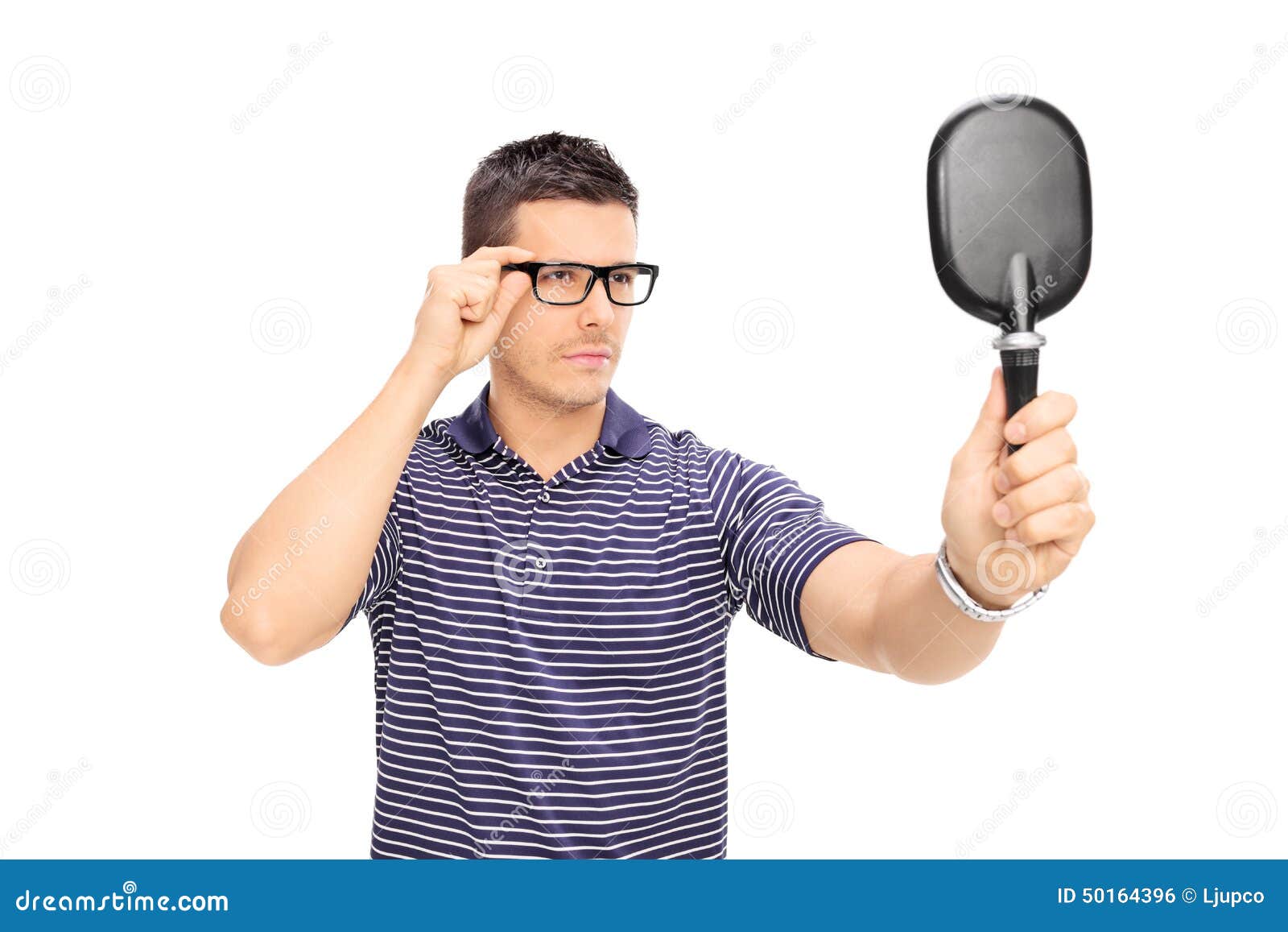 Man with Glasses Looking Himself in a Mirror Stock Photo - Image of ...