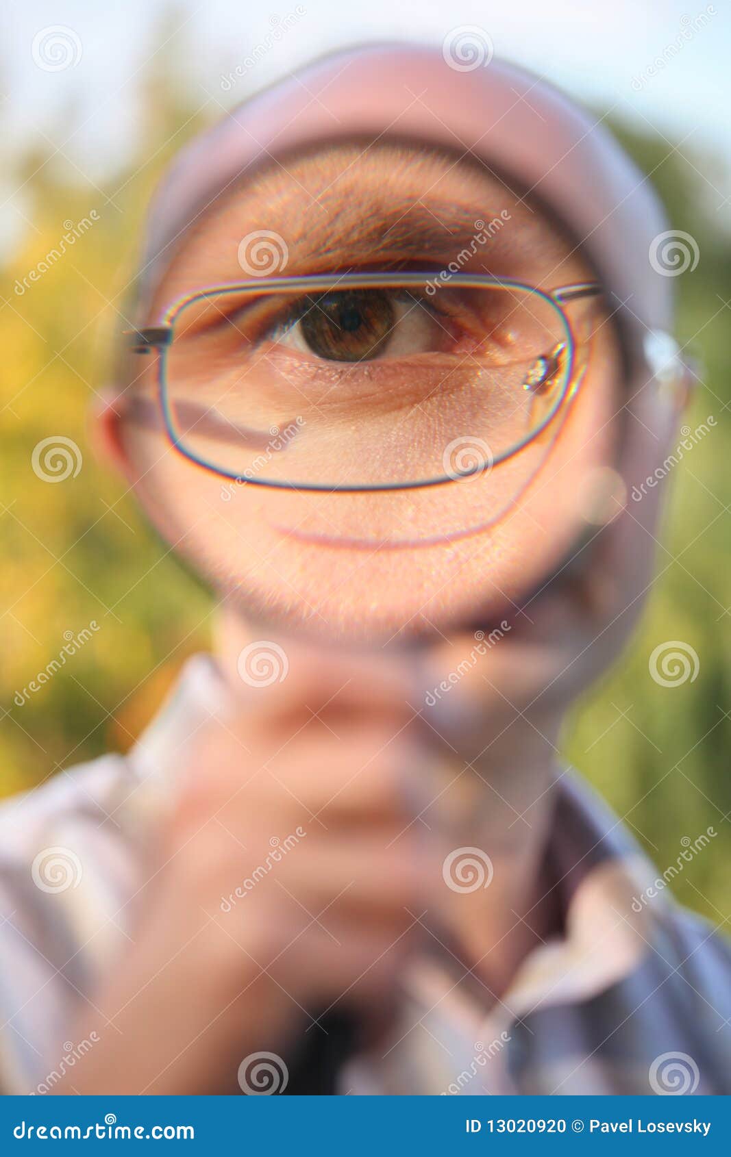 Man with Glasses Looking through Magnifier Stock Photo - Image of ...