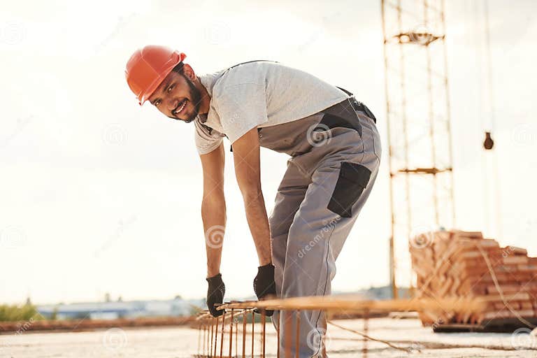 Man in Glasses is Standing with Indian Guy on the Construction Site ...