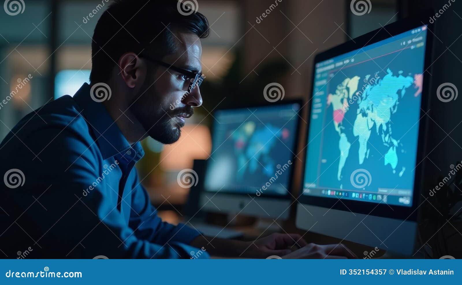 Man in Glasses Working on Computer in Dark Room Stock Image - Image of ...