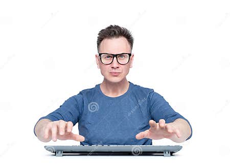 Man in Glasses Working at the Computer, His Hands Hover Over the ...