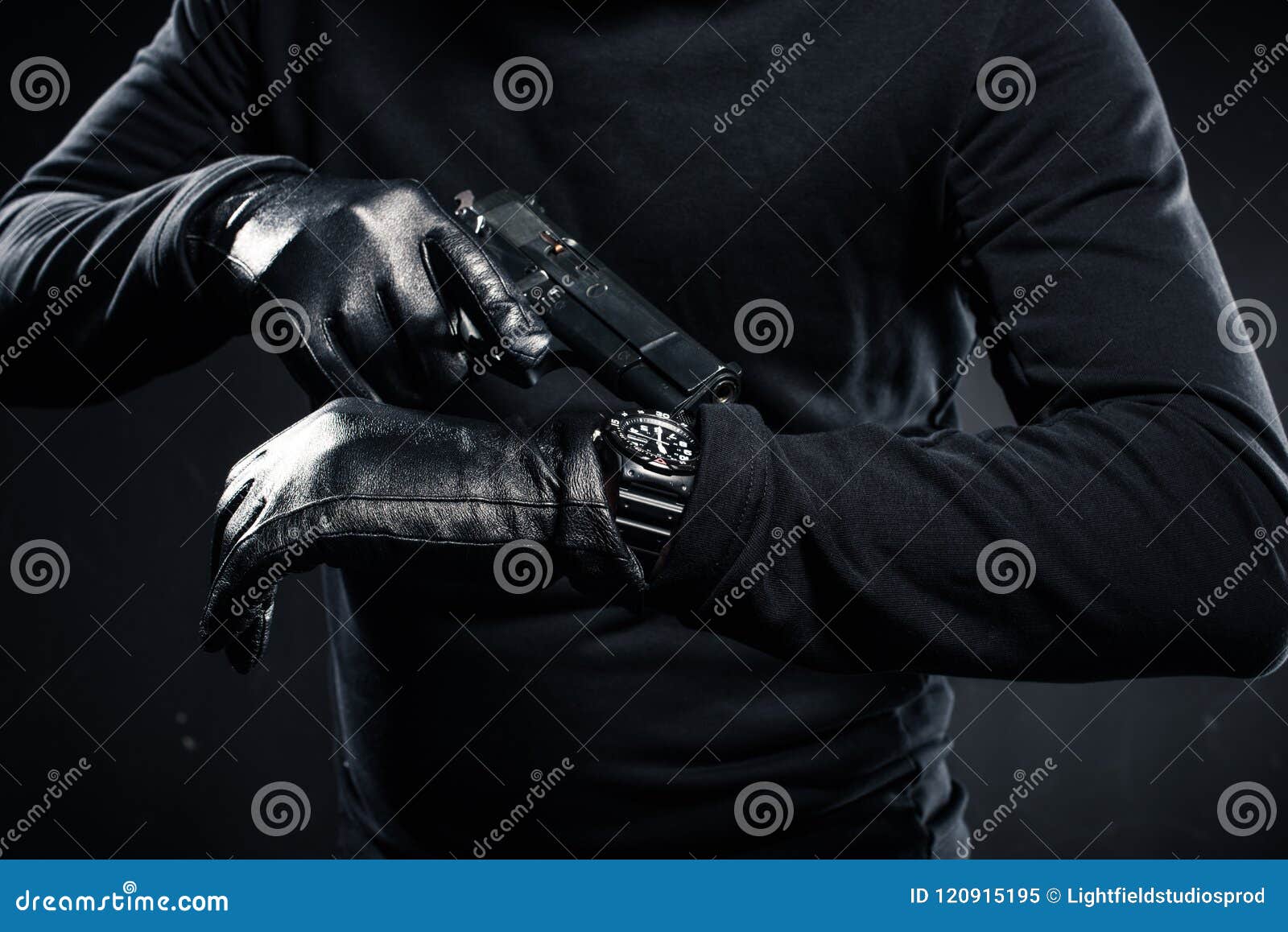 Man in Gloves with Gun Checking Stock Image - Image of black, safe ...