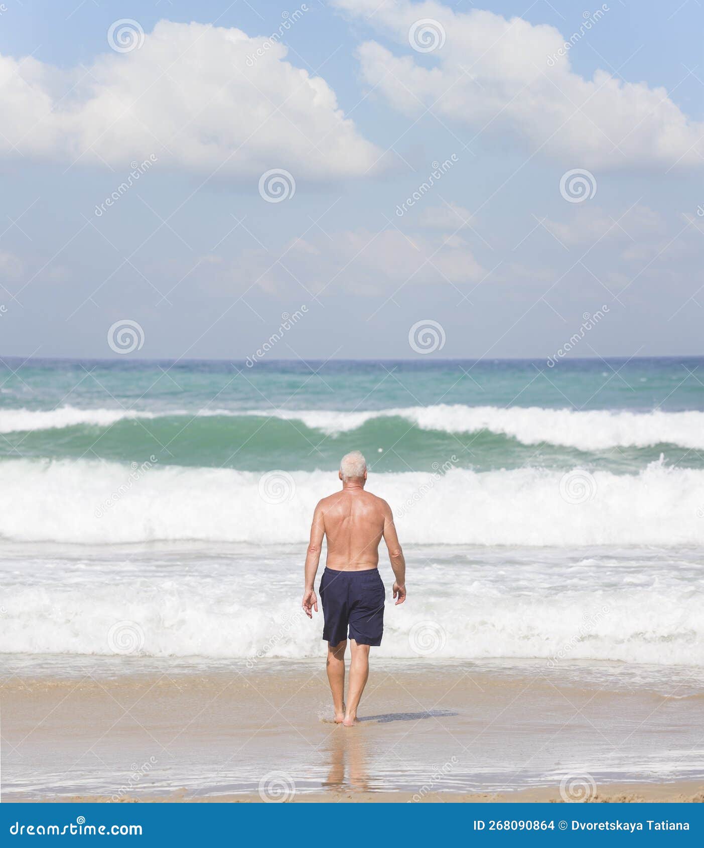 A Man Goes Swimming in Dangerous Big Waves Stock Photo - Image of ...