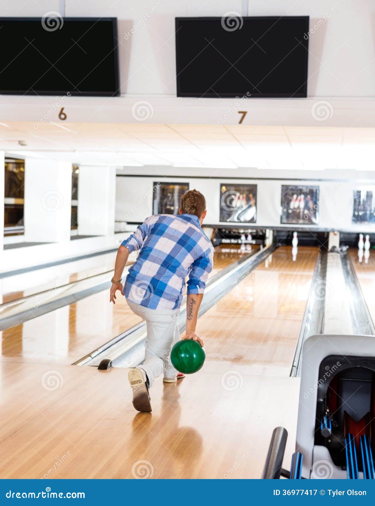 Man Going for the Last Pin in Bowling Alley Stock Image - Image of last ...