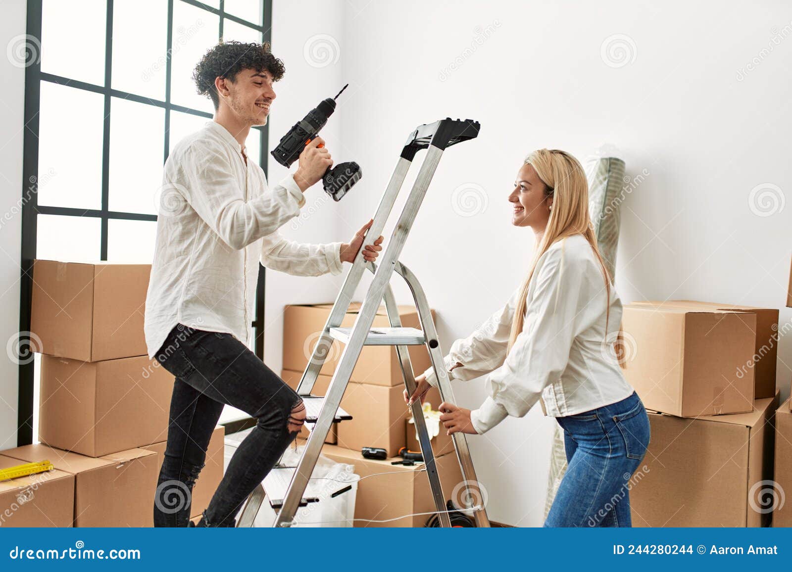 Man Going Up Ladder Holding Drill at New Home Stock Photo - Image of ...
