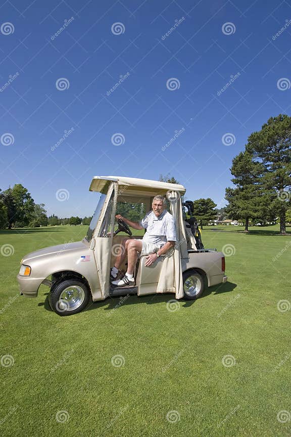 Man on a Golf Cart stock photo. Image of green, escape - 6106912