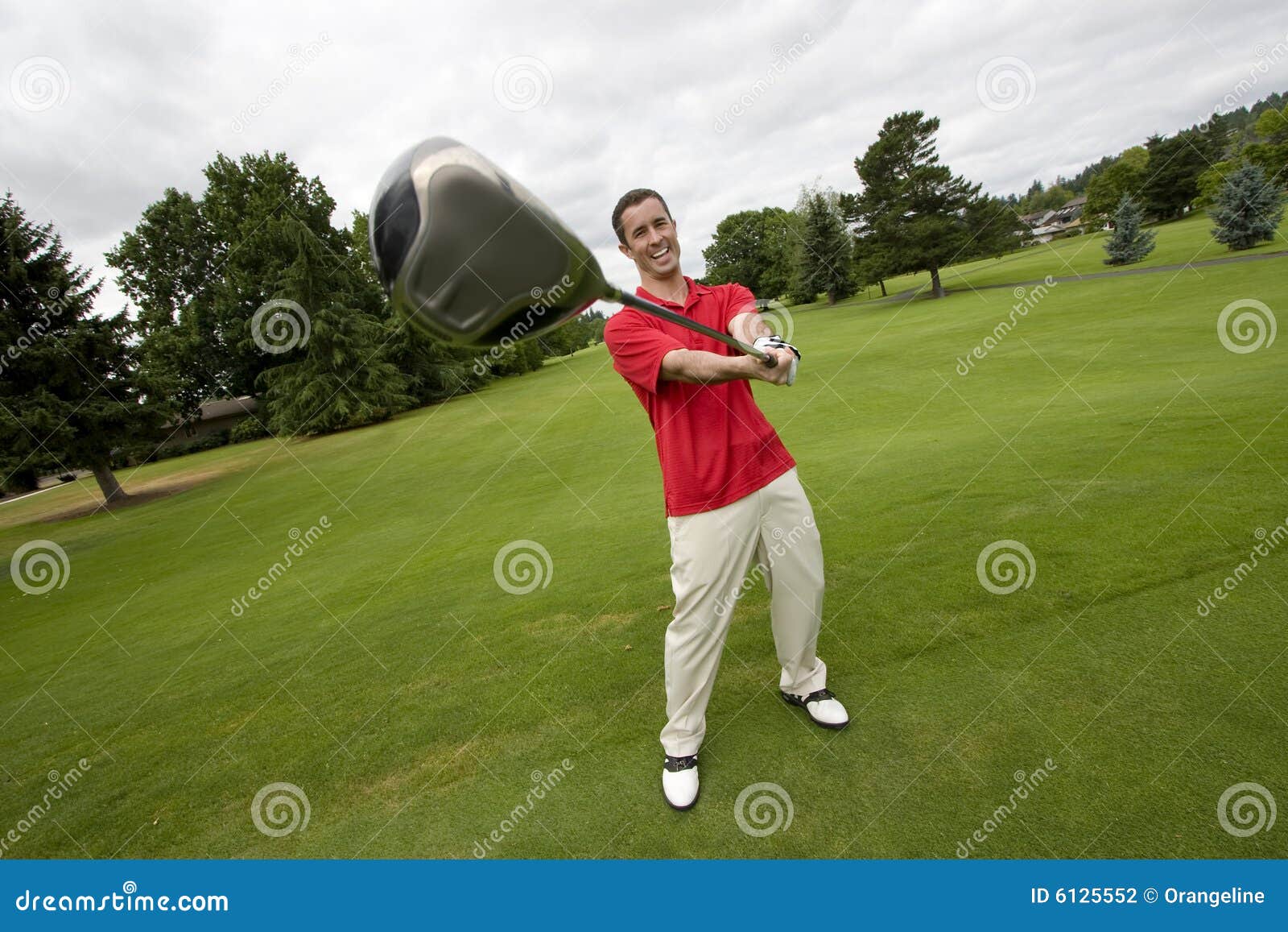 Man with Golf Club - Horizontal Stock Photo - Image of smile, putt: 6125552