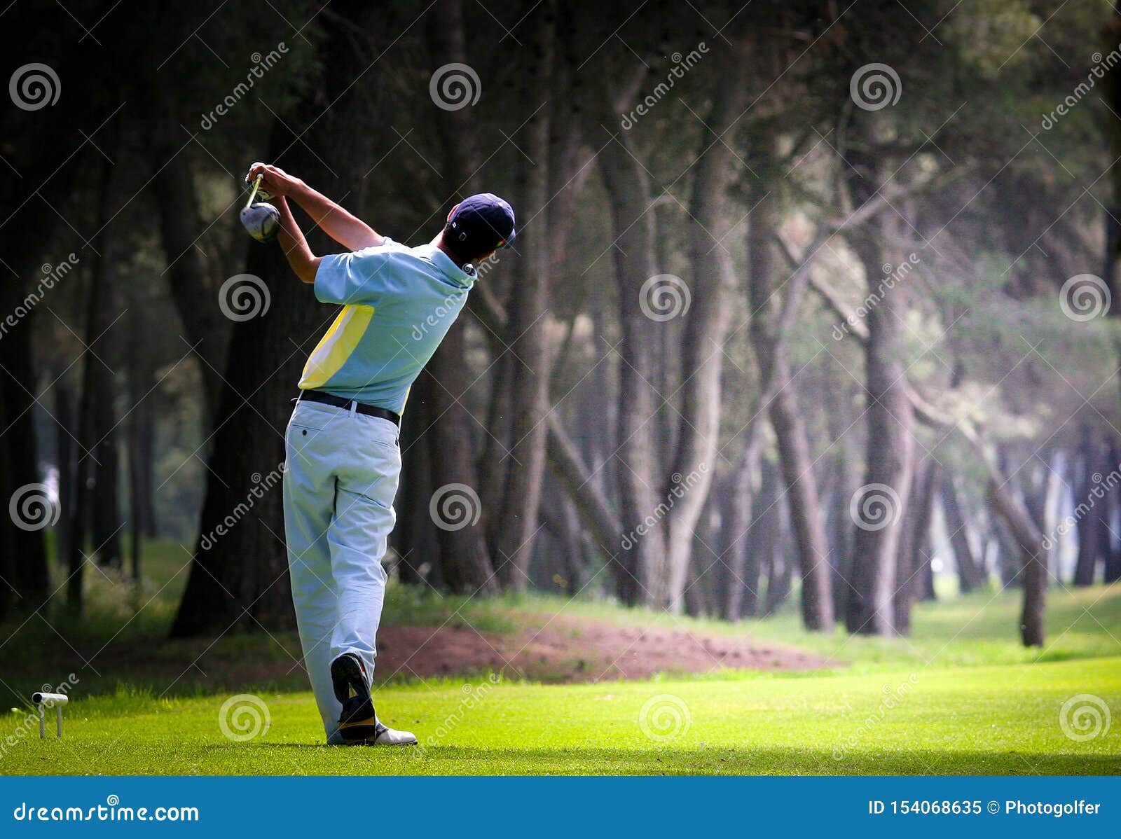 Man Golfer on a Golf Course Editorial Image - Image of green, swing ...