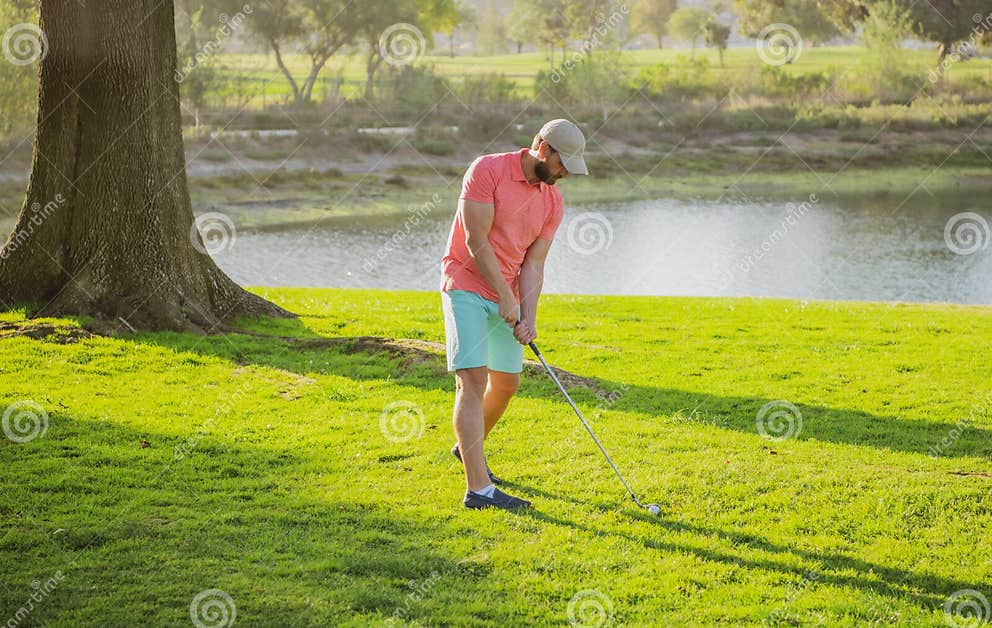 Man Golfer Playing Golf on a Golf Course. Stock Photo - Image of ...
