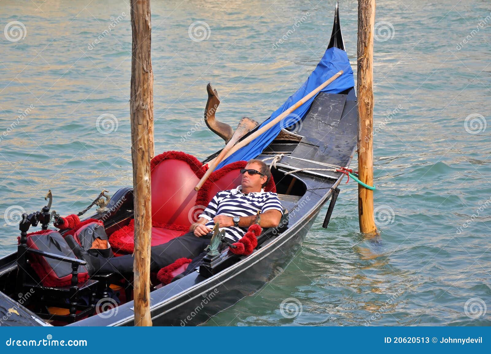 Man on Gondola Having a Rest Editorial Stock Photo - Image of lagoon ...