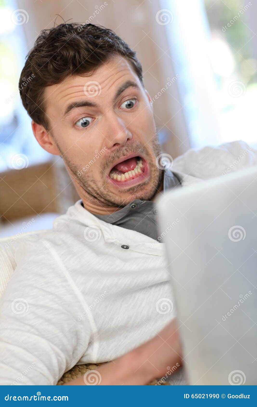 Man Got Scared in Front of Tablet Stock Photo - Image of digital, look ...