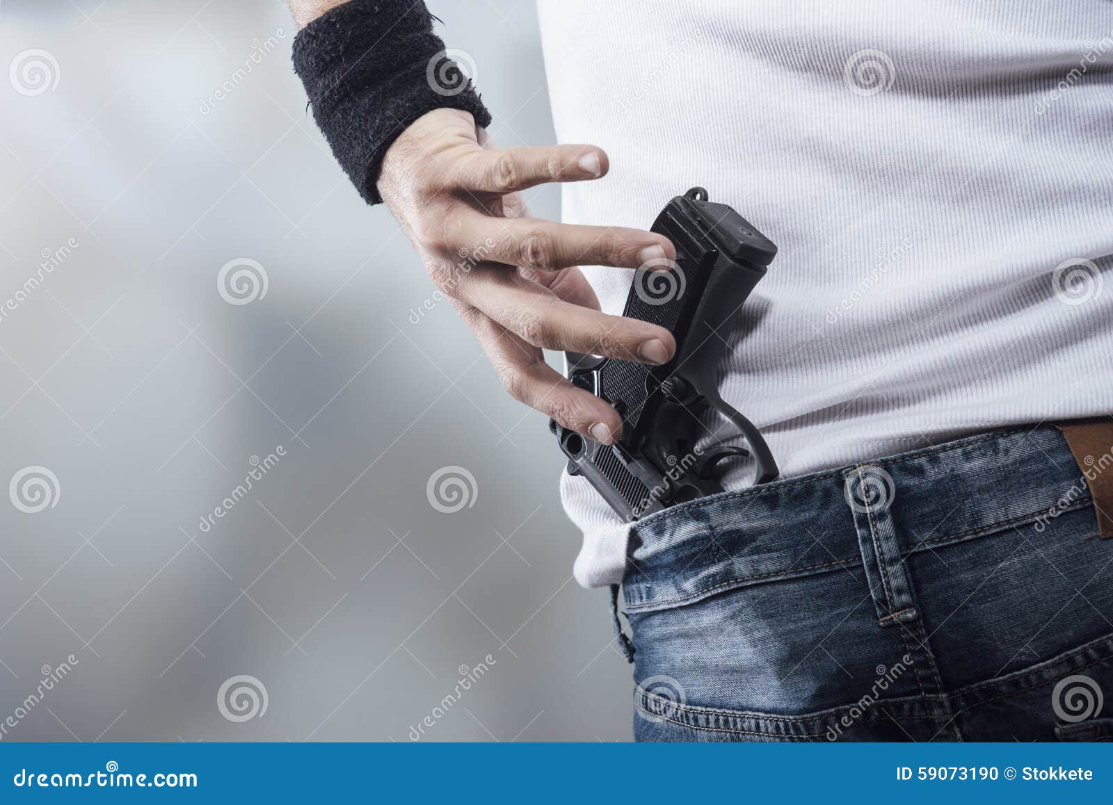 Man grabbing his pistol stock photo. Image of fast, pistol - 59073190