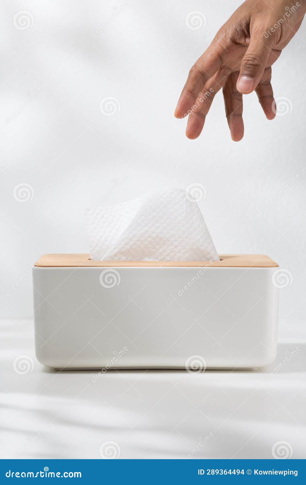 The Man is Grabbing a Tissue Paper from a White Box Stock Photo - Image ...