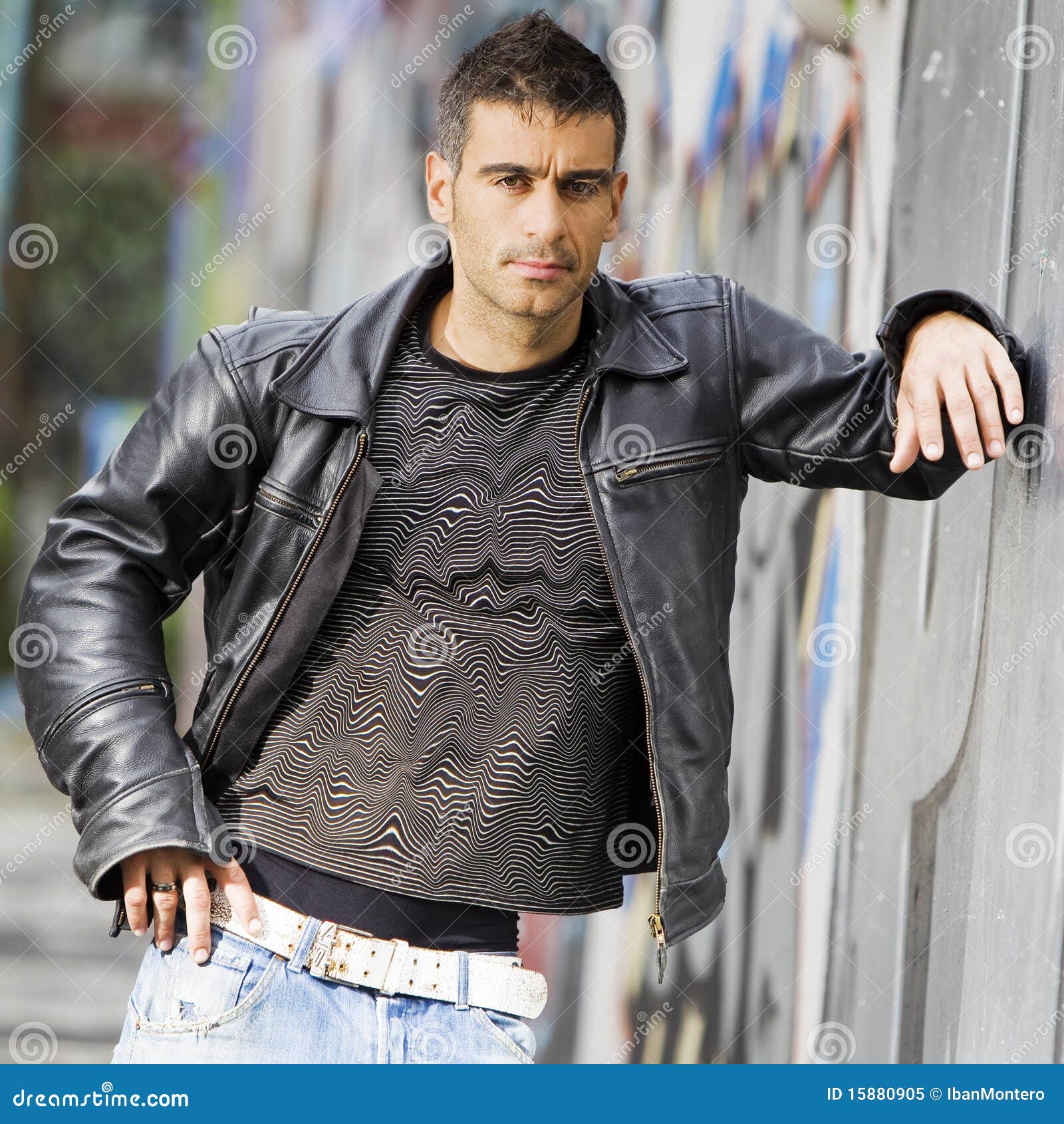 Man in graffiti background stock image. Image of portrait - 15880905
