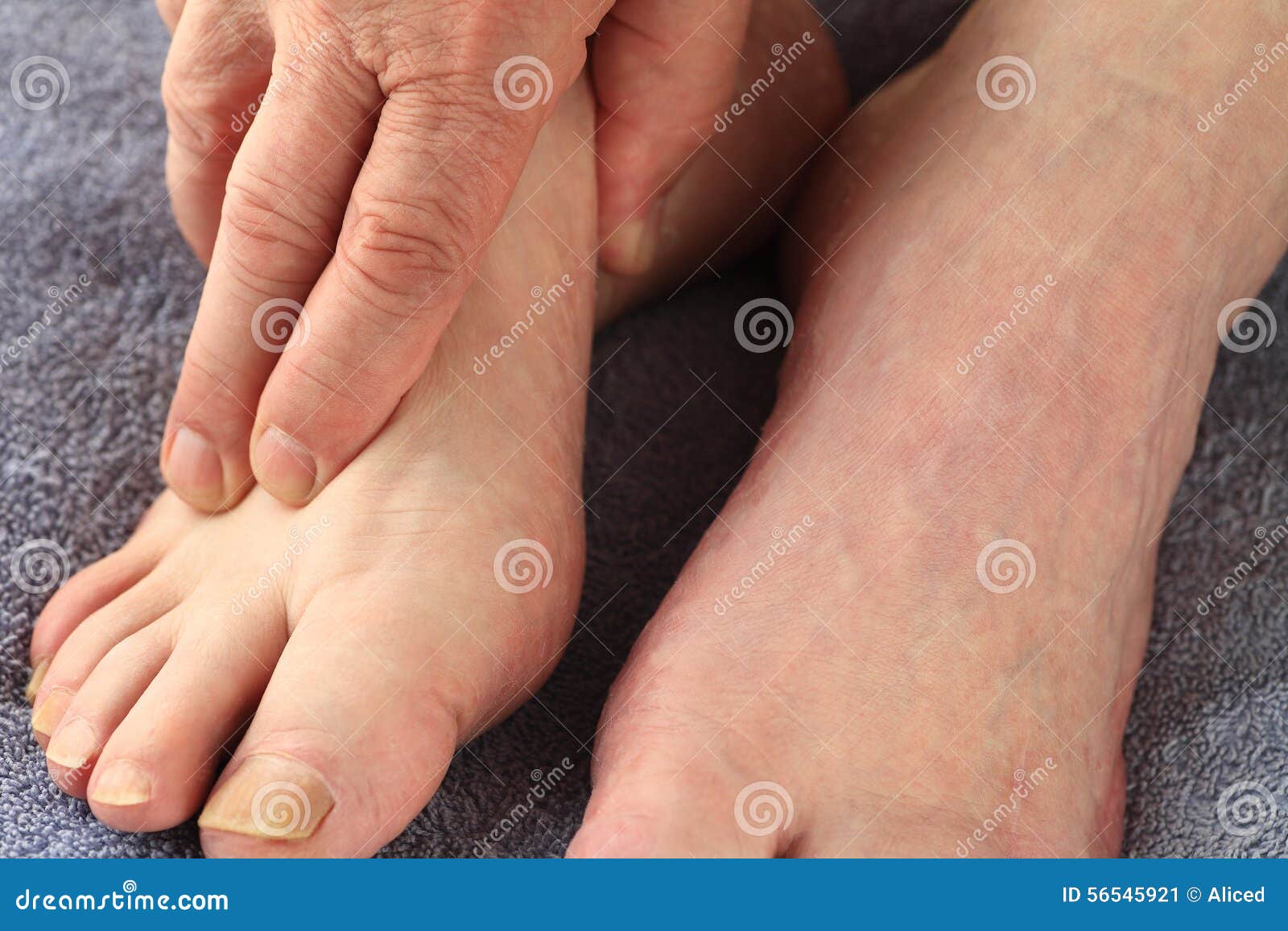 Man grasping foot stock image. Image of care, podiatry - 56545921