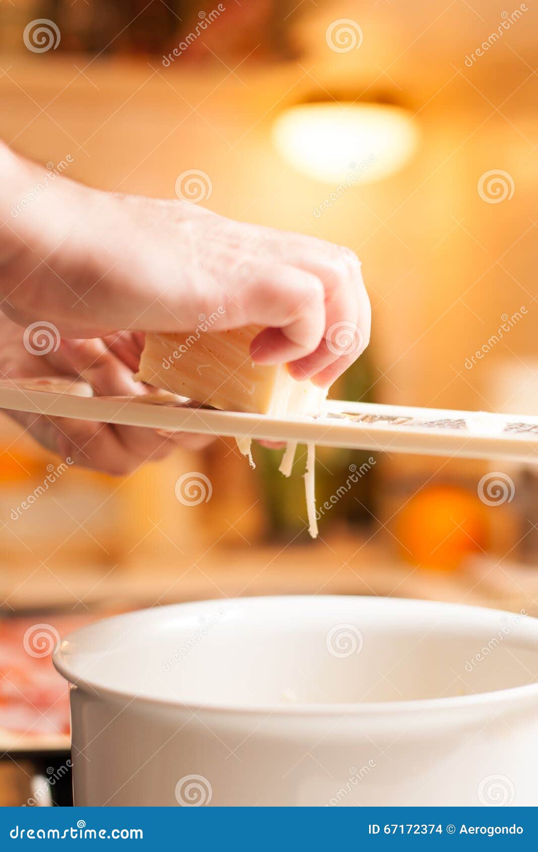 Man grating cheese stock photo. Image of grater, closeup - 67172374
