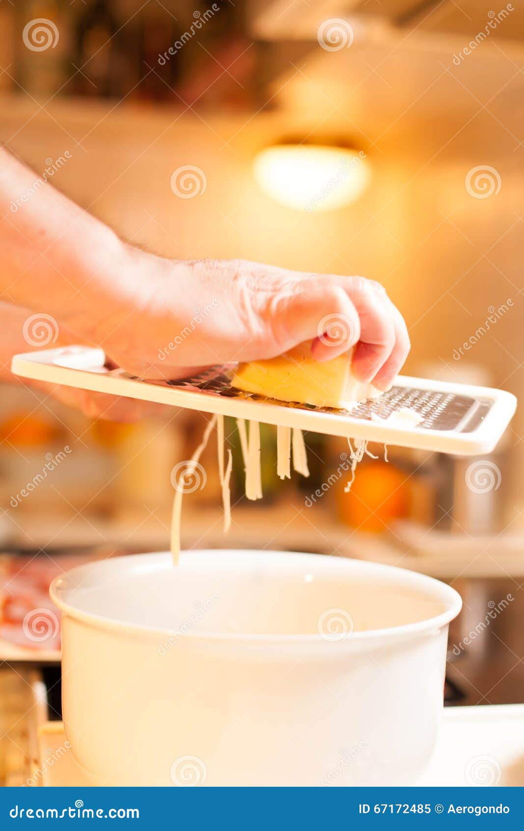 Man grating cheese stock image. Image of cheese, gourmet - 67172485