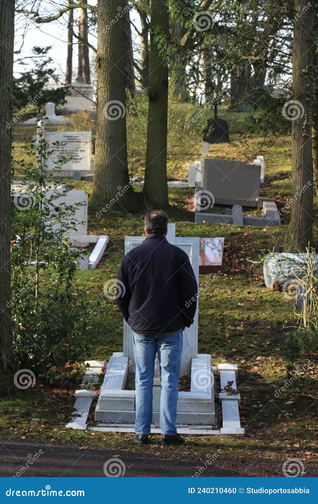 Man on a graveyard editorial image. Image of respect - 240210460
