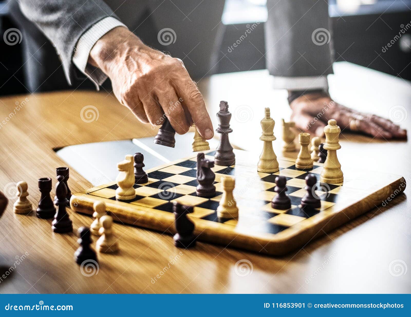 Man In Gray Suit Playing Chess Picture. Image: 116853901