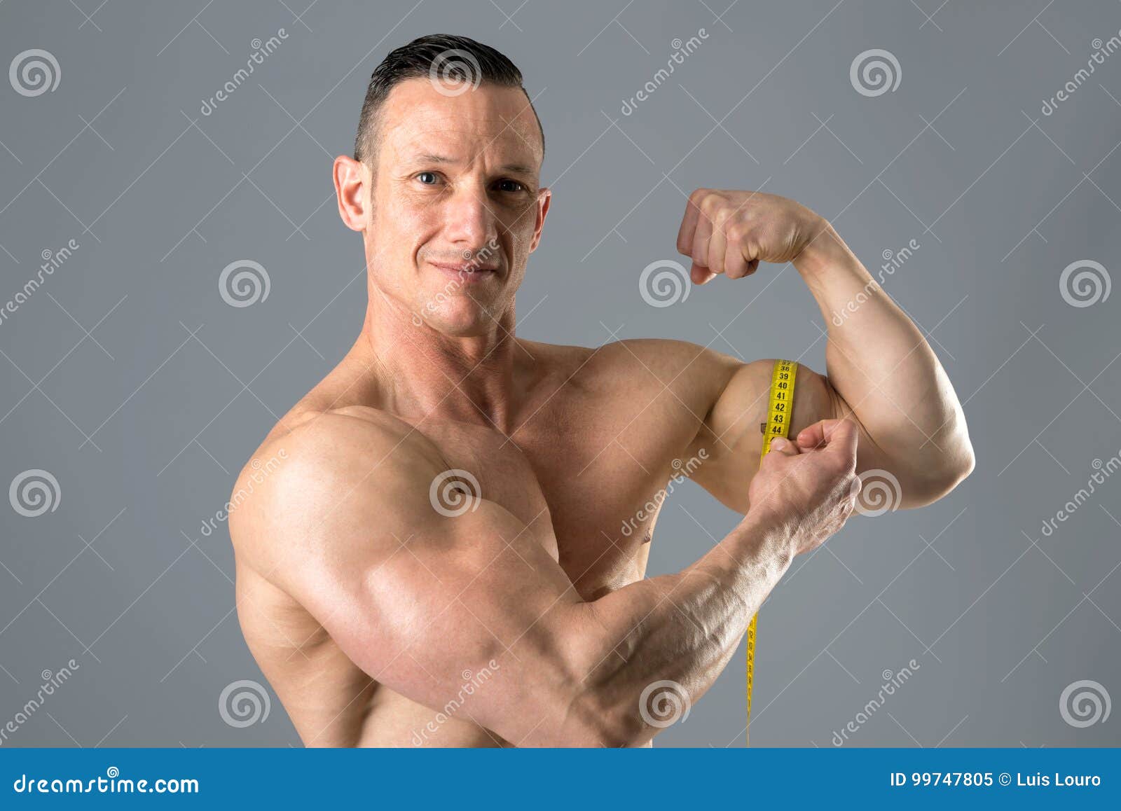 Man with great biceps stock image. Image of sport, muscular - 99747805