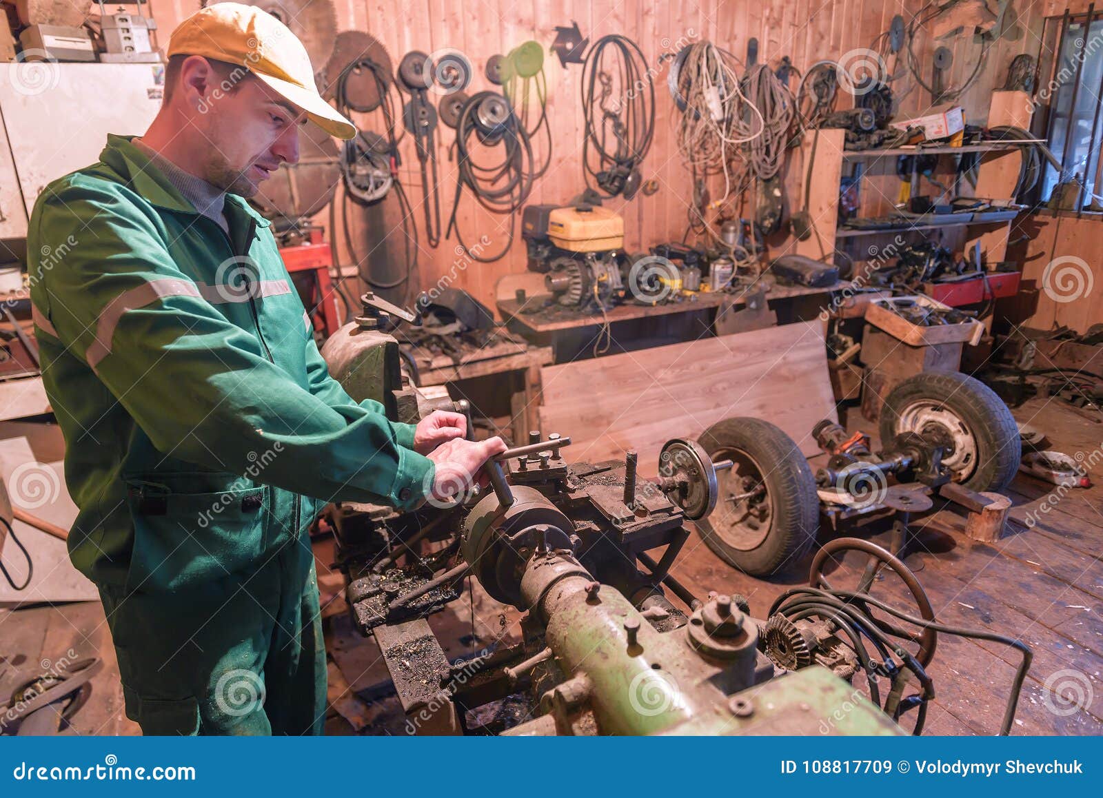 A Man in a Green Overall in Workshop Stock Image - Image of manual ...