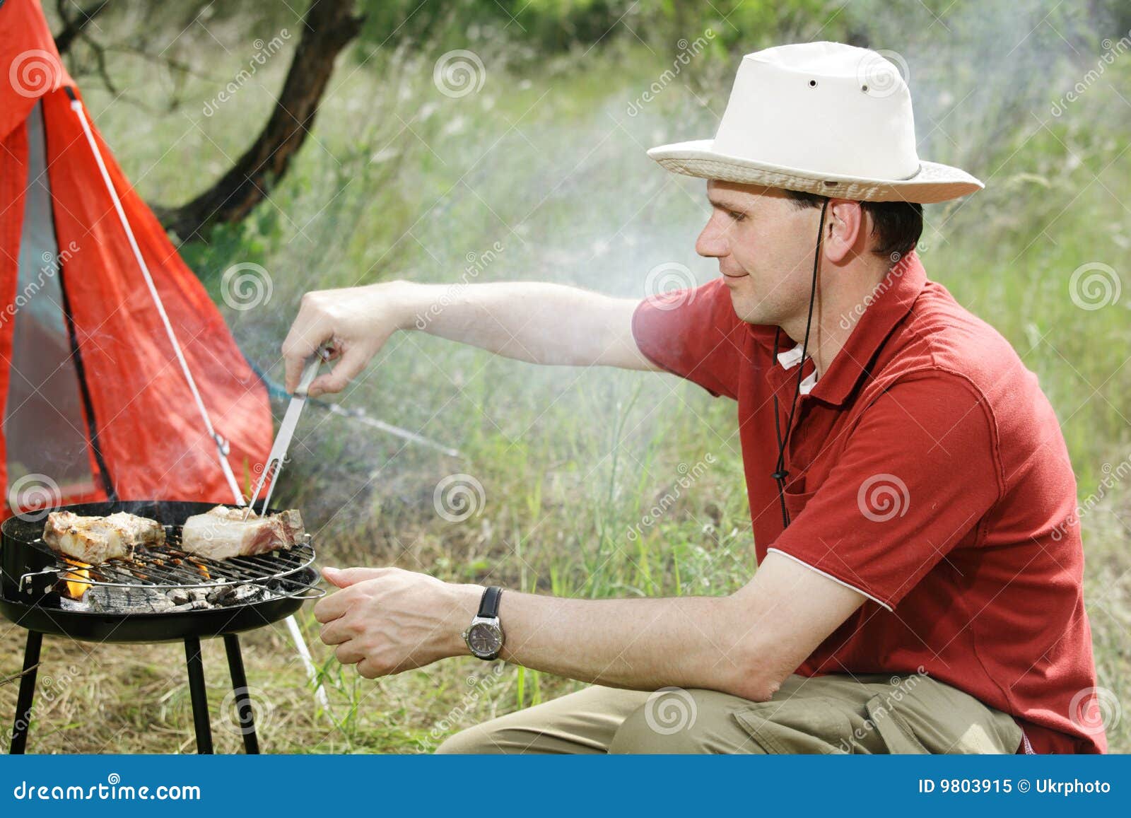 Man with grill stock image. Image of sitting, grilled - 9803915