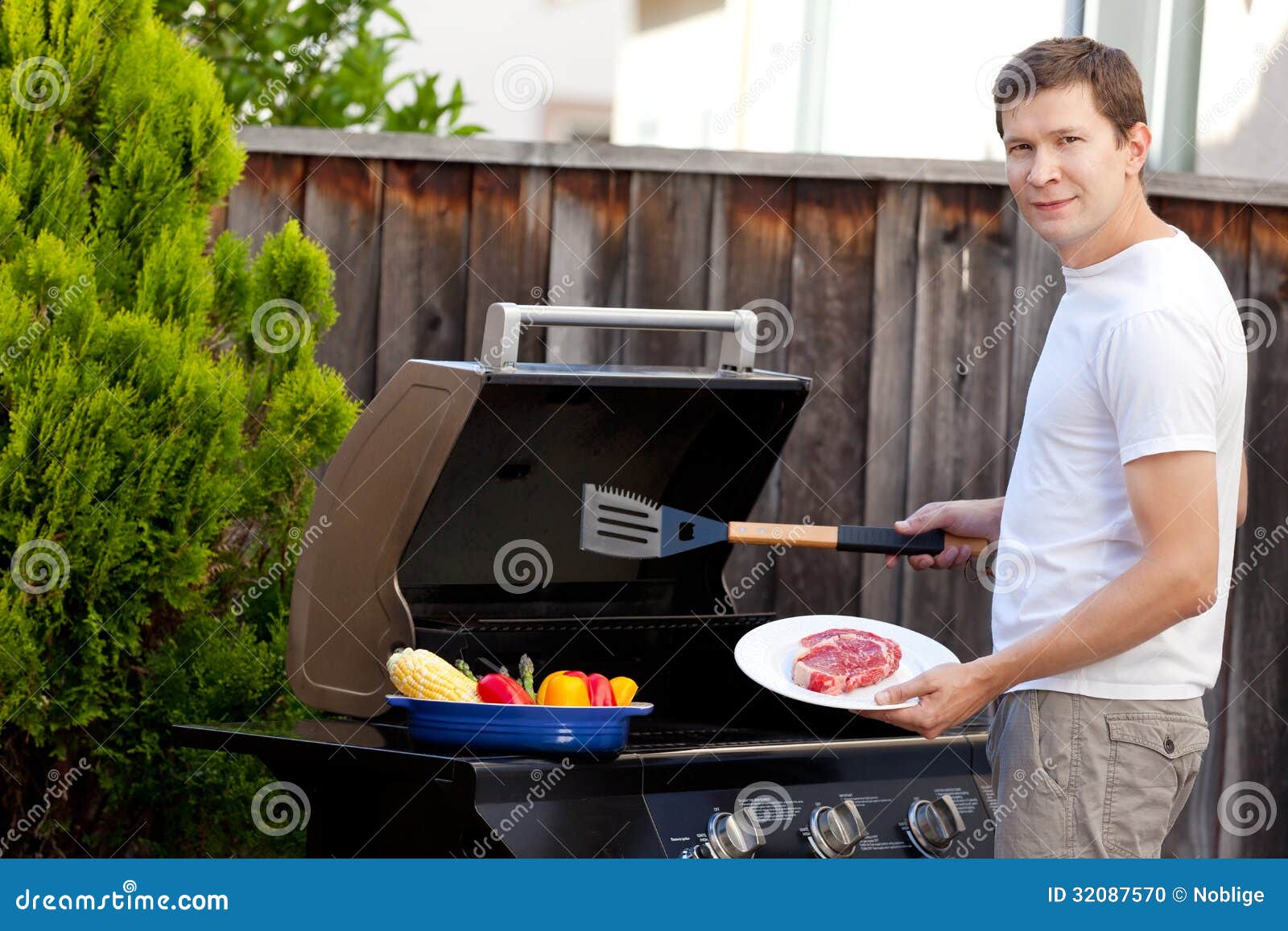Man grilling food stock photo. Image of cook, hand, party - 32087570