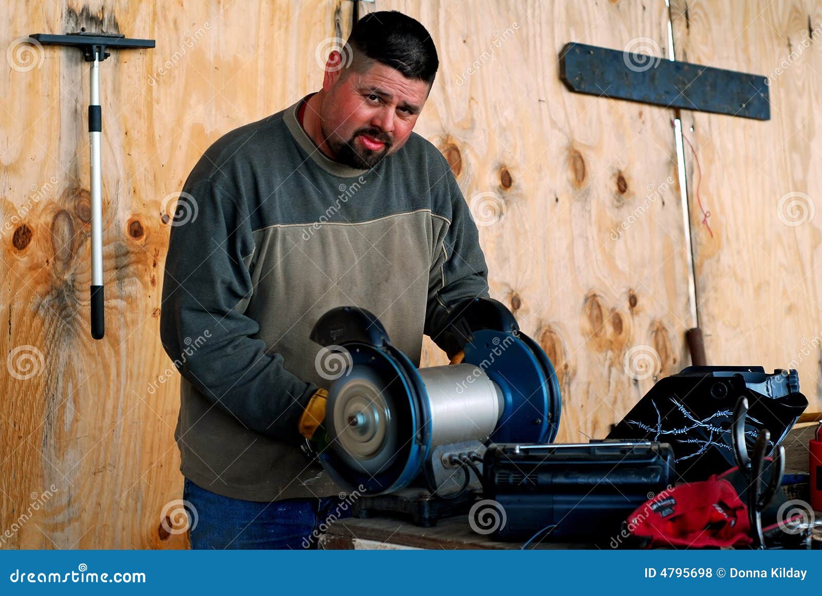 Man and grinding tool stock photo. Image of mexican, wood - 4795698