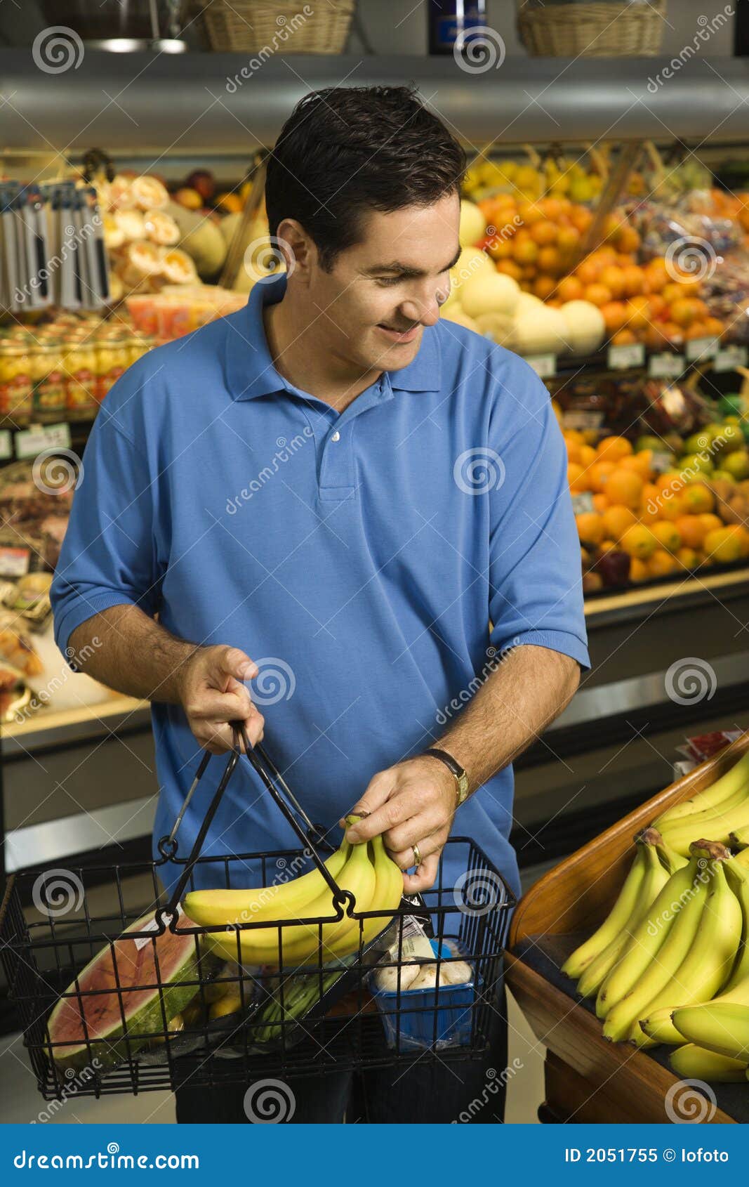 Man grocery shopping. stock image. Image of nutrition - 2051755