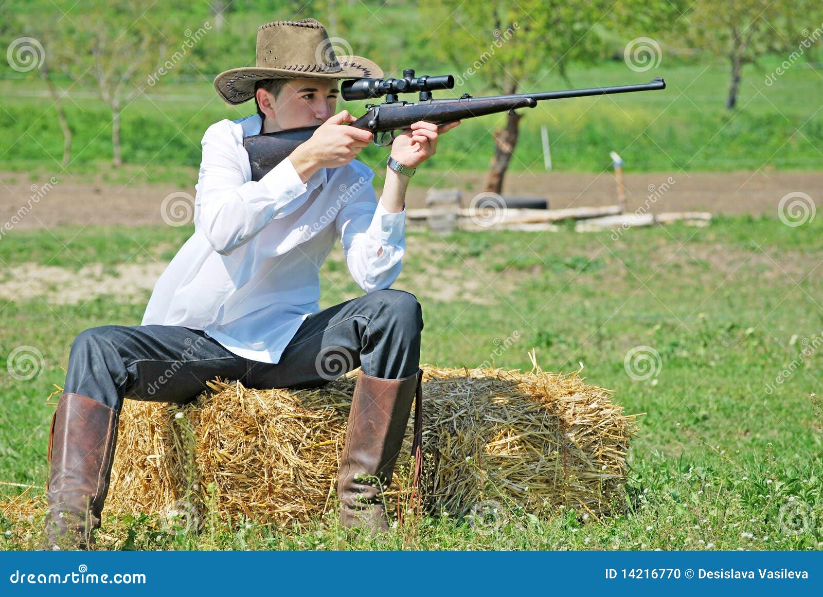 Man with a gun stock photo. Image of straw, farm, agricultural - 14216770