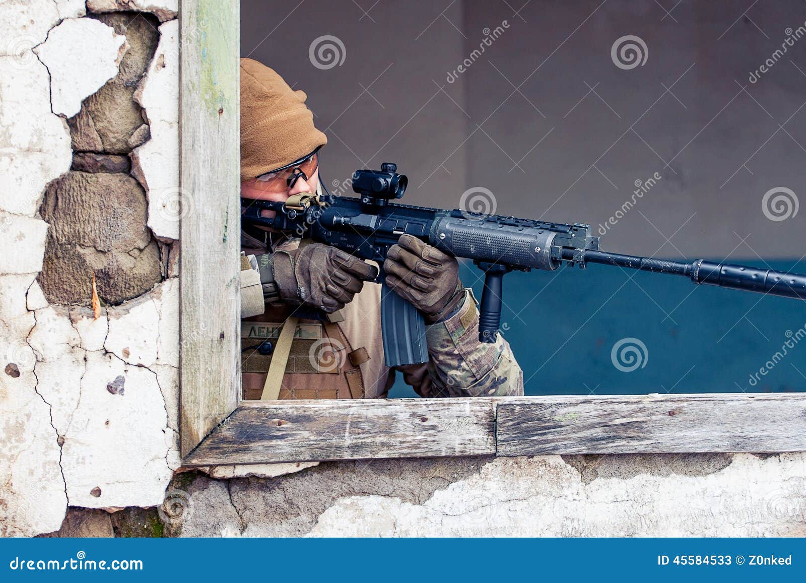 Man with a Gun in the Window Editorial Stock Photo - Image of battle ...
